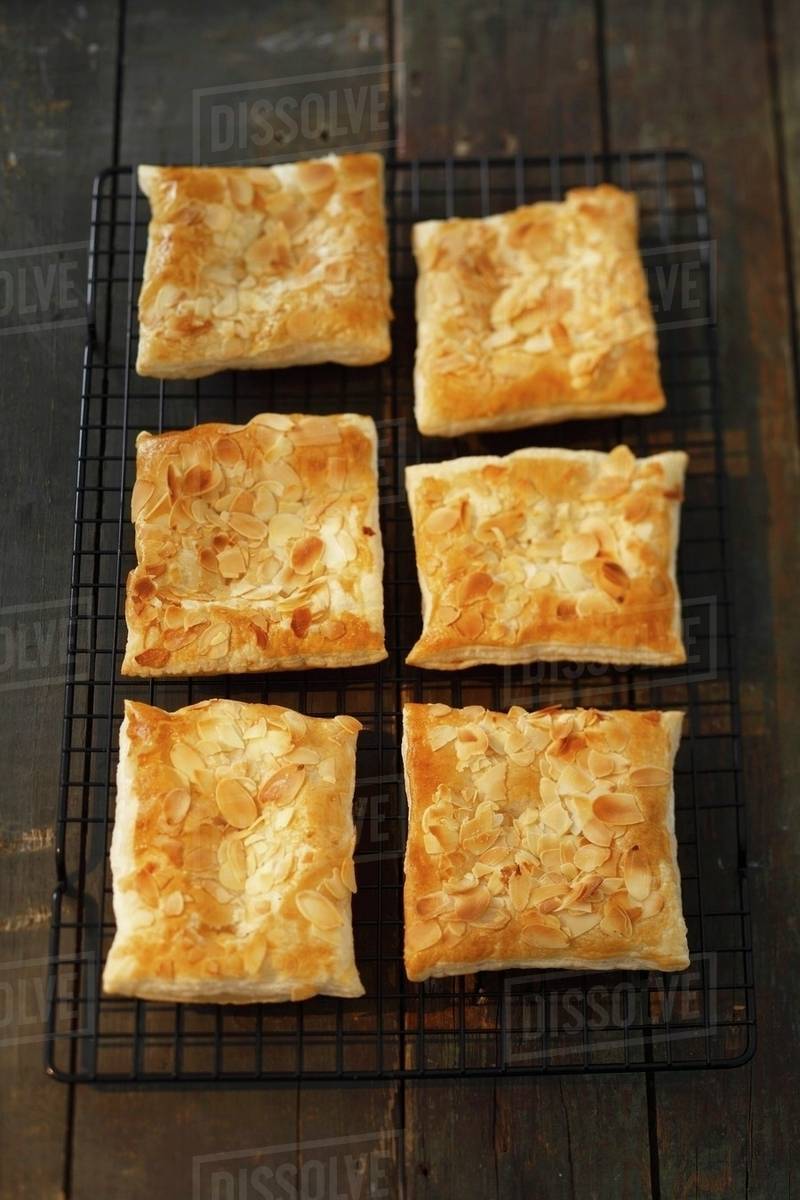 Puff pastry slices with sliced almonds - Royalty-free Stock Photo ...