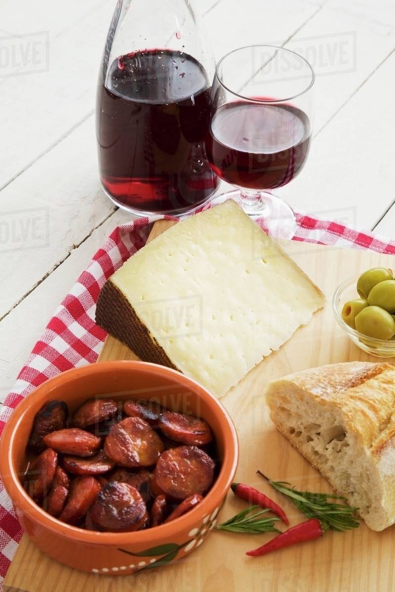 Manchego, chorizo, bread, olives and red wine (Spain) - Royalty-free ...