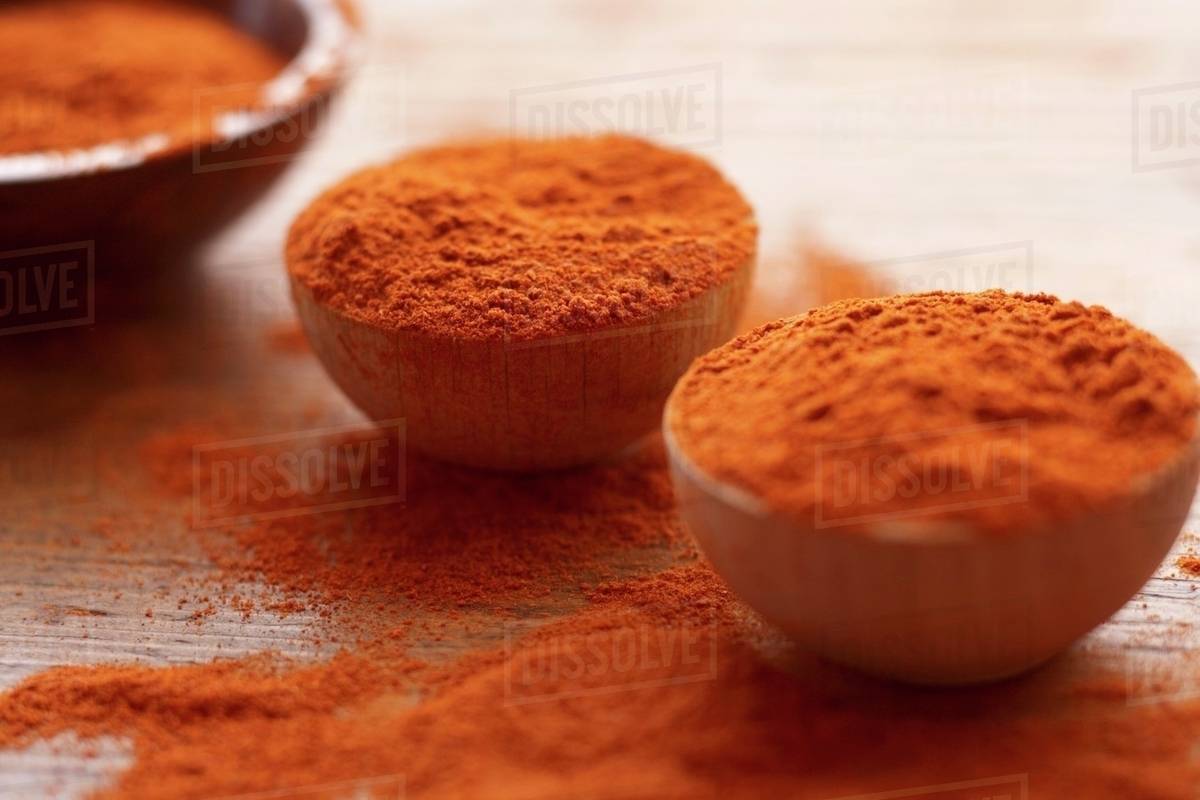 Paprika in small wooden bowls - Royalty-free Stock Photo | Dissolve