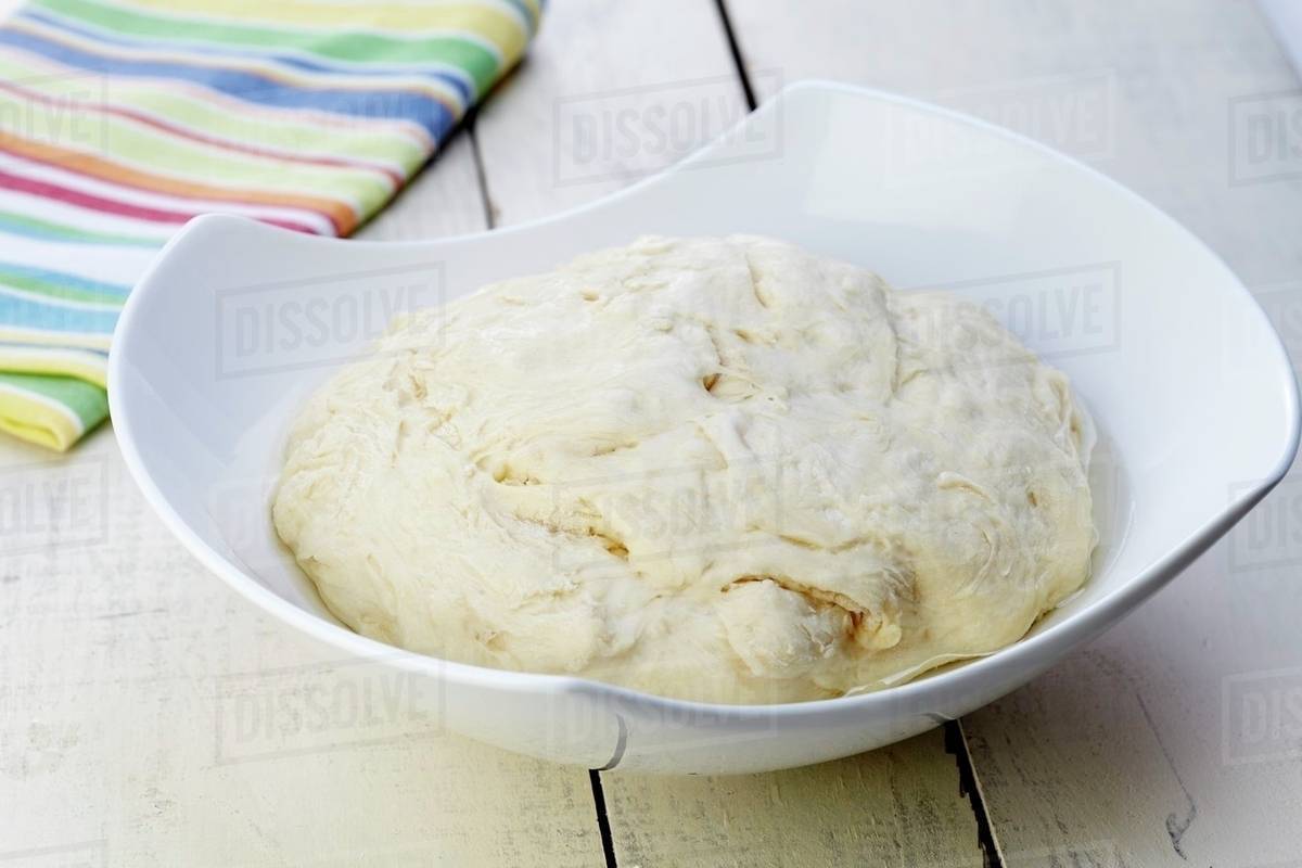 Pizza Dough Rising in a Bowl - Royalty-free Stock Photo | Dissolve