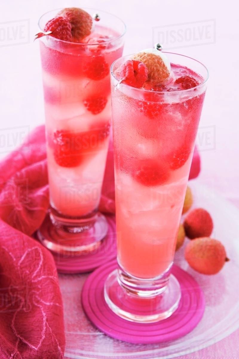 Raspberry and lychee cocktails - Royalty-free Stock Photo | Dissolve
