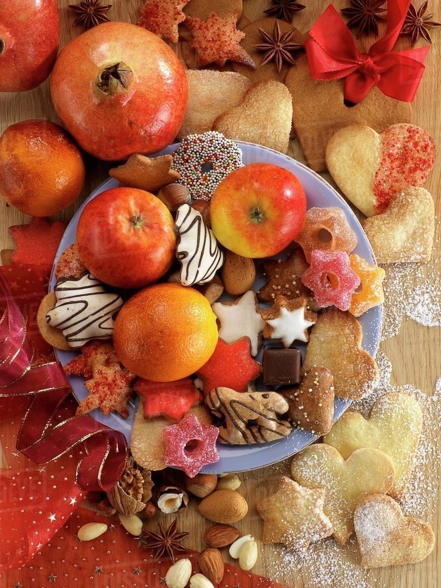 A Christmas arrangement of biscuits and fruit - Royalty-free Stock ...