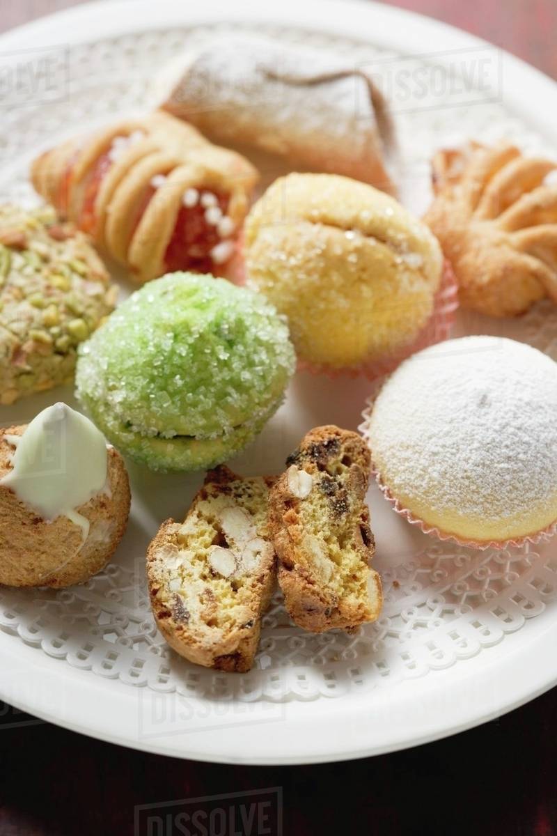 Assorted small pastries (cantucci, pistachio balls etc.) - Stock Photo ...