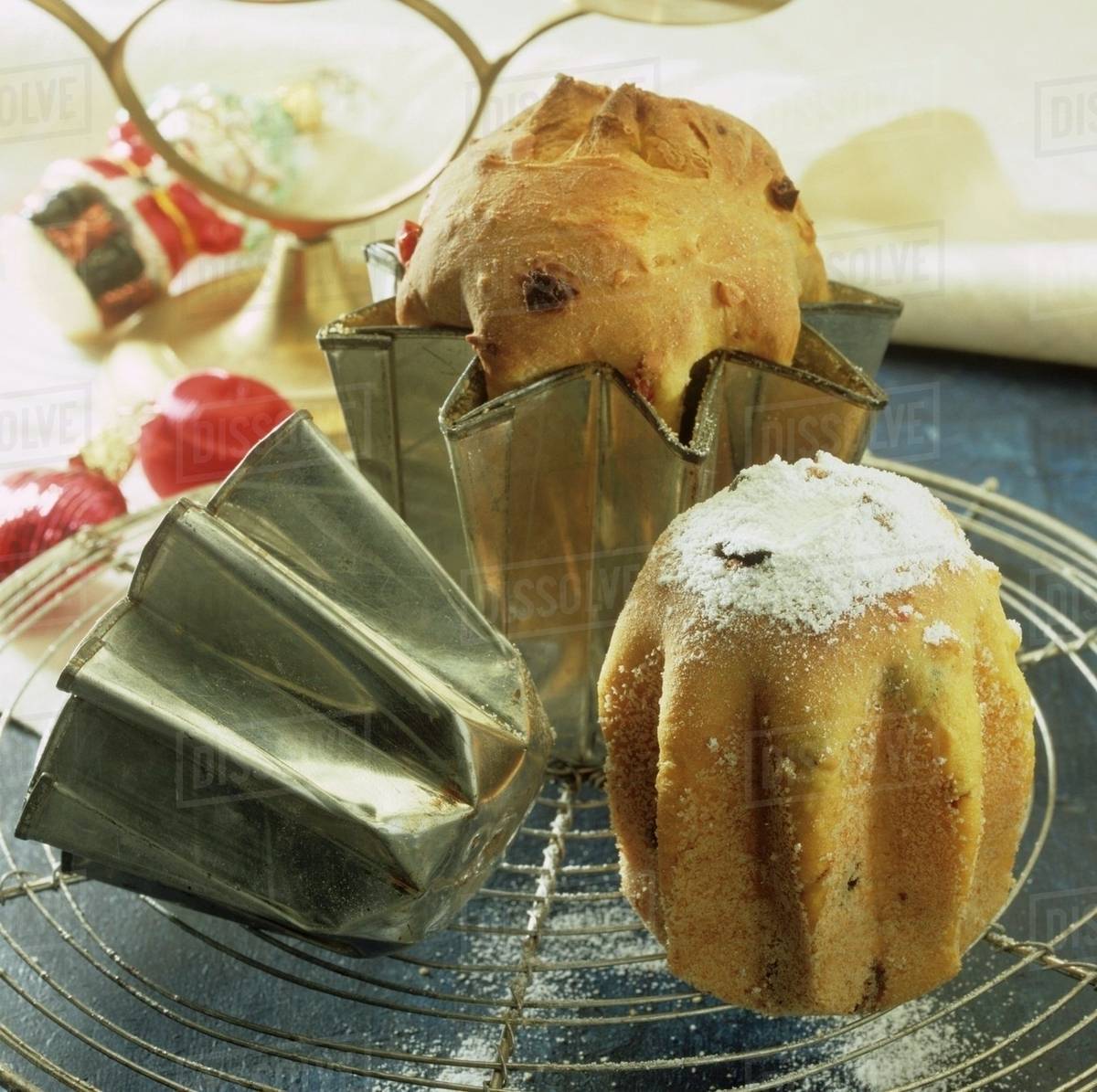 Two small panettone (yeasted cakes) for Christmas - Stock Photo - Dissolve