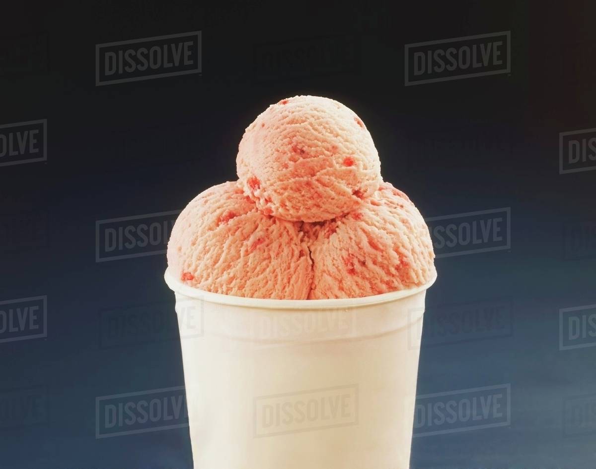 Strawberry ice cream in white beaker - Royalty-free Stock Photo | Dissolve