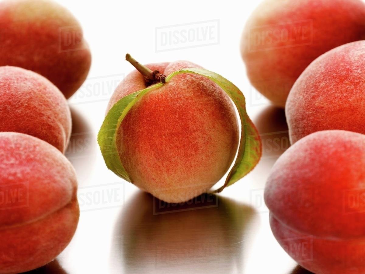 Seven peaches - Stock Photo - Dissolve