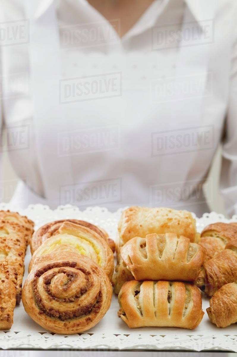 Assorted Danish pastries on a silver tray - Stock Photo - Dissolve