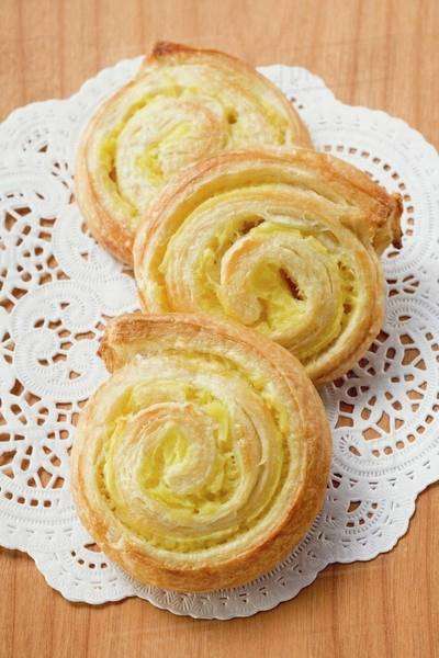 Three Danish pastry snails with custard filling - Royalty-free Stock ...