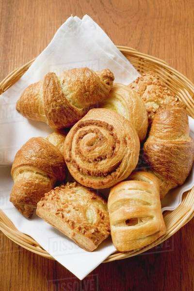 Assorted Danish pastries in a small basket - Royalty-free Stock Photo ...