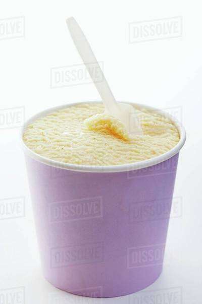 Vanilla ice cream in cardboard tub - Royalty-free Stock Photo | Dissolve
