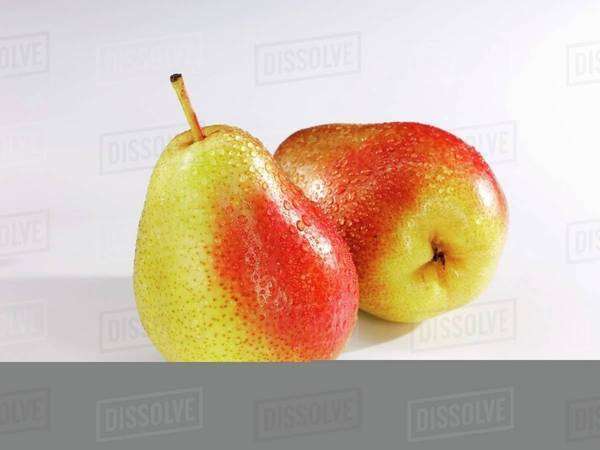 Two pears with drops of water - Royalty-free Stock Photo | Dissolve