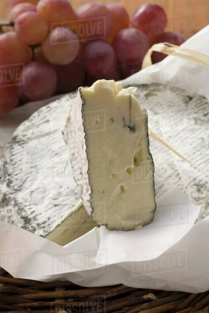 Blue cheese (Bresse Bleu, France) and grapes - Royalty-free Stock Photo ...