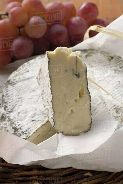 Blue cheese (Bresse Bleu, France) and grapes - Royalty-free Stock Photo ...