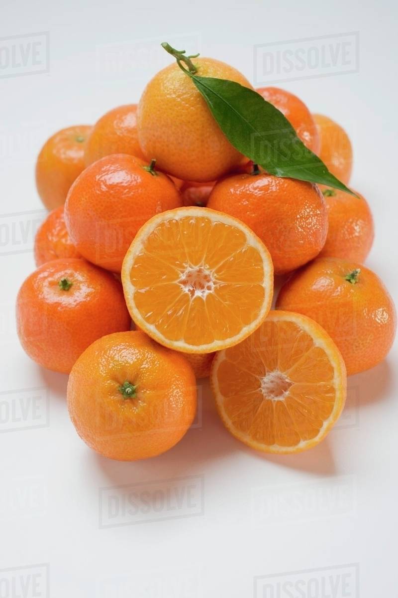 A heap of clementines - Royalty-free Stock Photo | Dissolve
