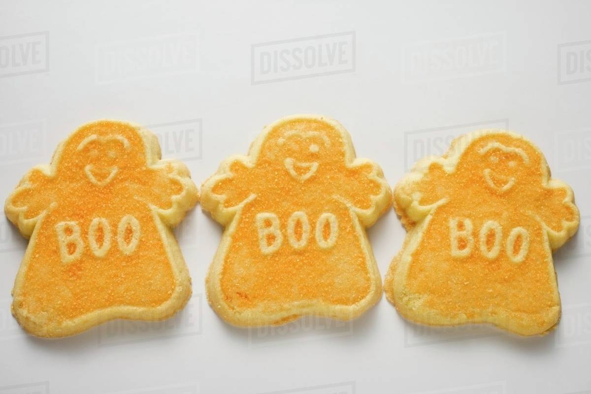 Three orange ghost biscuits for Halloween - Royalty-free Stock Photo ...
