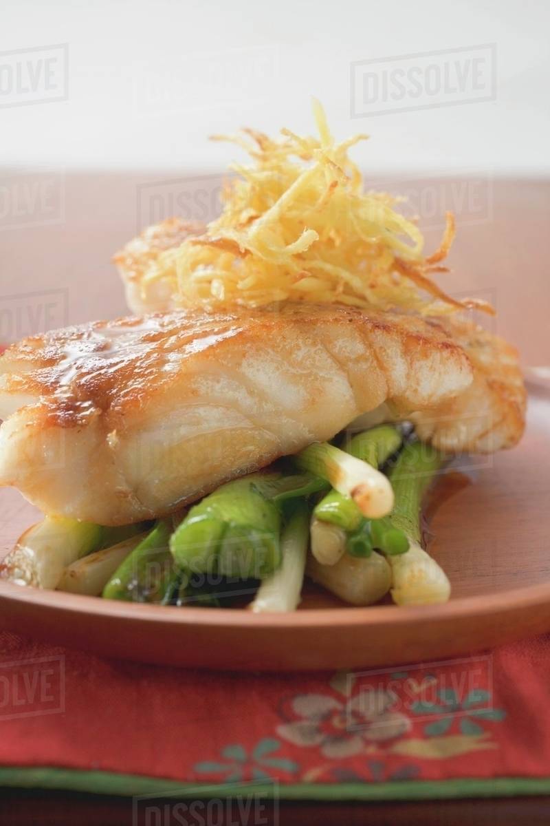 Fish fillet with spring onions - Royalty-free Stock Photo | Dissolve