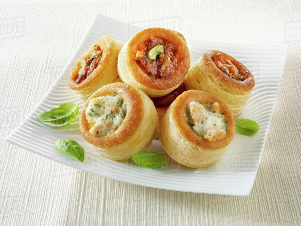 Puff pastry cases with various fillings - Stock Photo - Dissolve