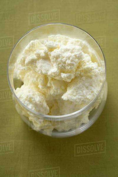 Quark in glass (overhead view) - Stock Photo - Dissolve