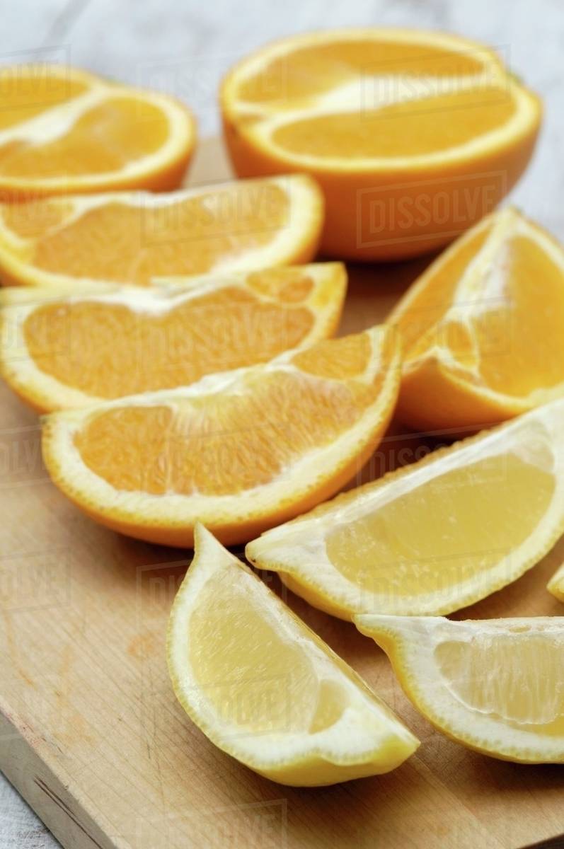 Orange and lemon wedges - Royalty-free Stock Photo | Dissolve