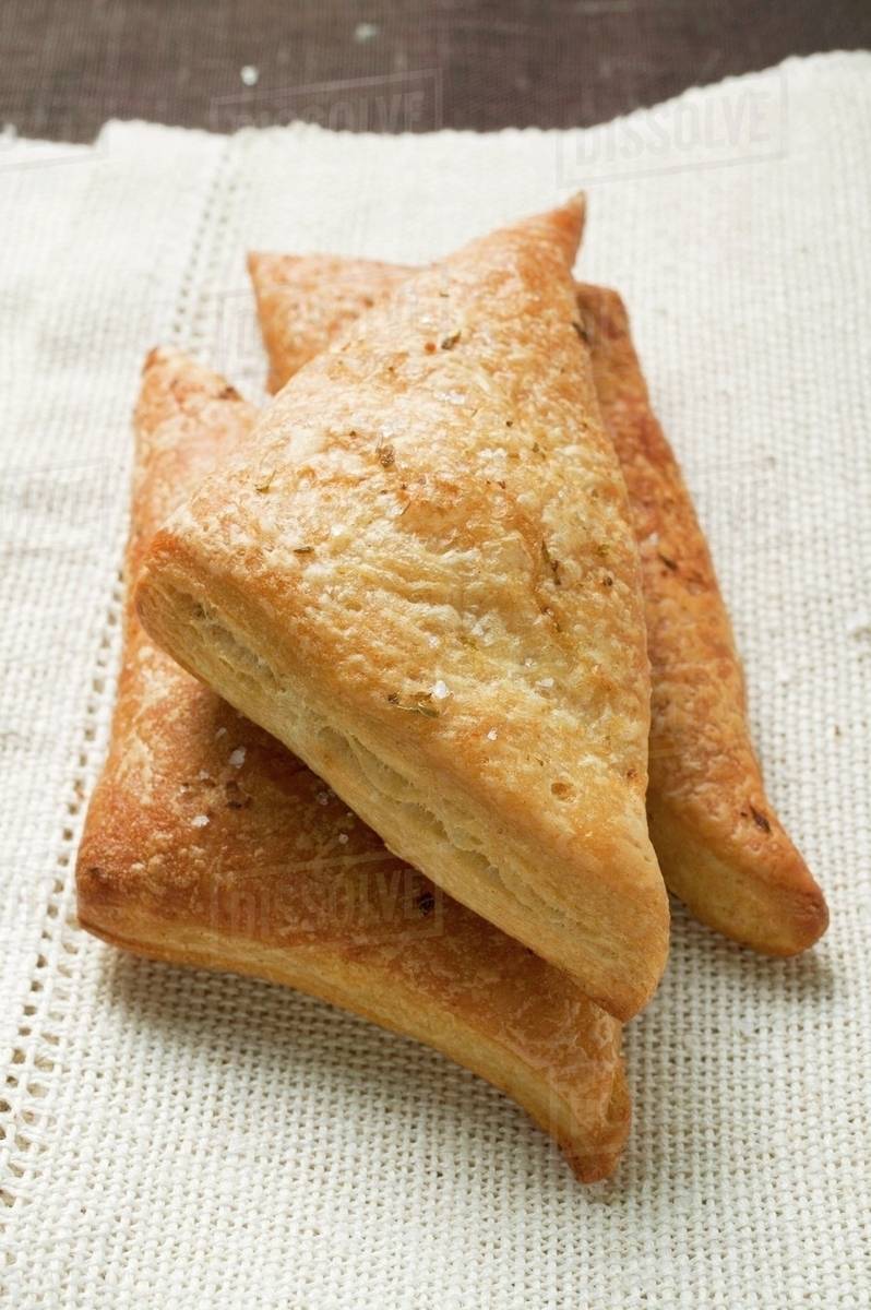Triangular savoury puff pastry pasties - Royalty-free Stock Photo ...