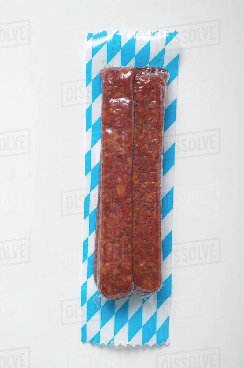 Landjager (Bavarian hard sausage, in packaging) - Stock Photo - Dissolve
