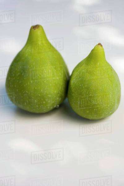 Two fresh green figs - Royalty-free Stock Photo | Dissolve