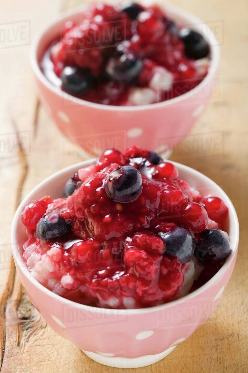 Rice pudding with berries - Stock Photo - Dissolve