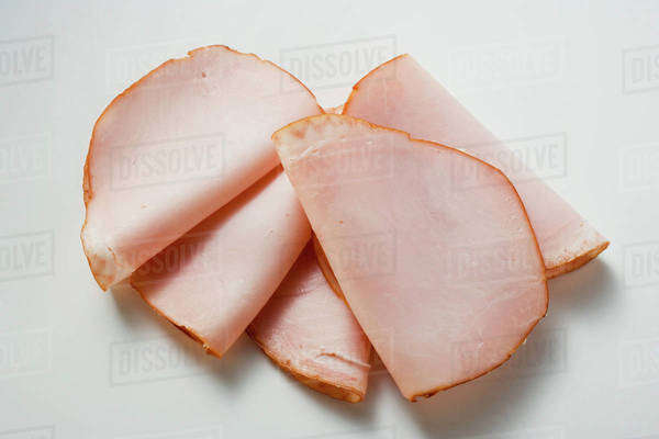 A few slices of turkey ham - Royalty-free Stock Photo | Dissolve