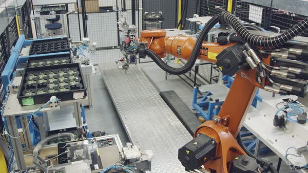 Large Robot working in an electronics manufacturing facility - Stock ...