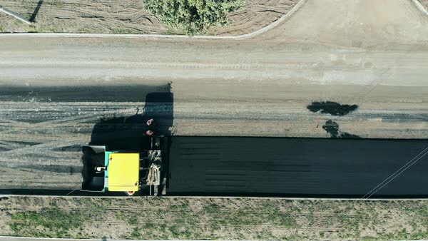 Road construction process. Top view of a roadway in progress with the ...