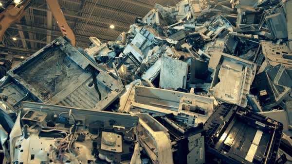 Debris of broken tv-sets and computers in a pile. Garbage, trash, waste ...