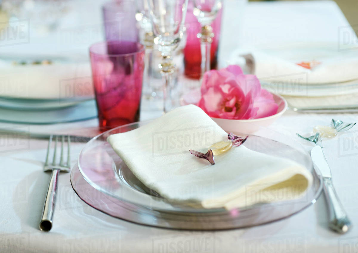 Set and decorated table, close-up - Royalty-free Stock Photo | Dissolve