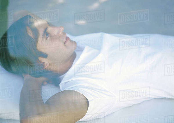 Man lying down - Royalty-free Stock Photo | Dissolve