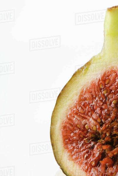 Fresh fig, cross section, cropped - Royalty-free Stock Photo | Dissolve