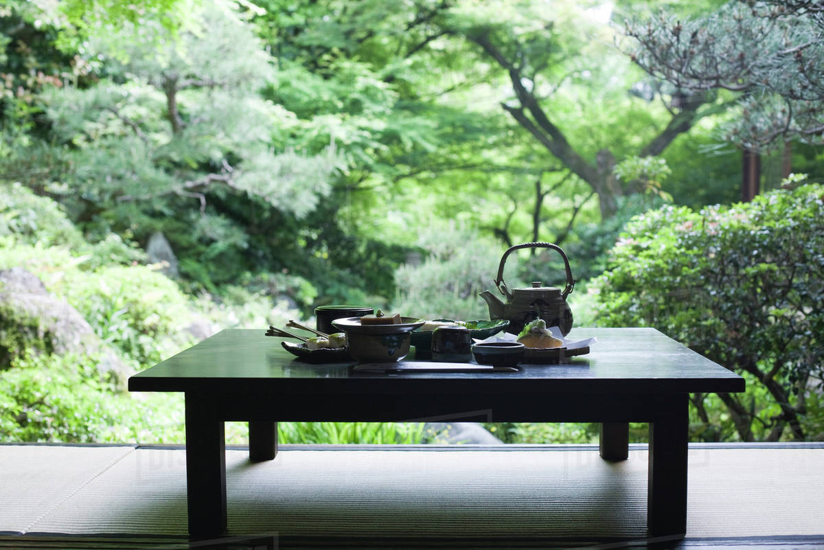 Traditional Japanese meal on table outdoors - Stock Photo - Dissolve