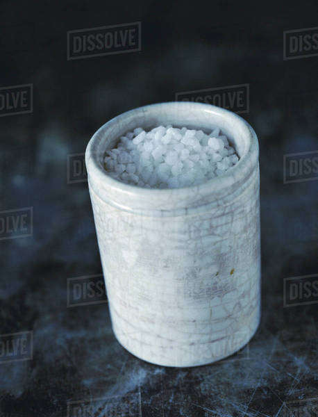 Coarse salt in ceramic container - Stock Photo - Dissolve