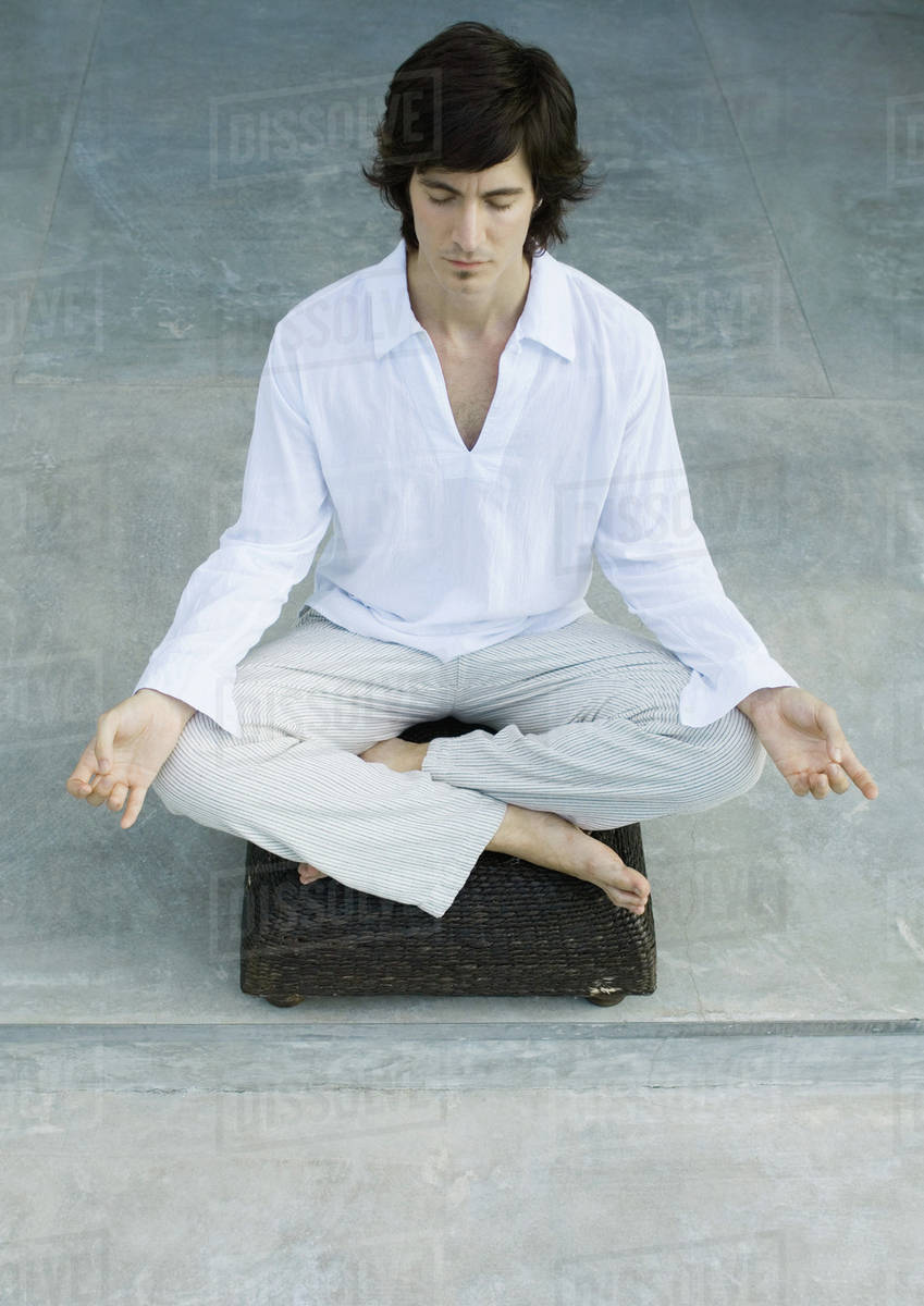 Man sitting in lotus position - Royalty-free Stock Photo | Dissolve