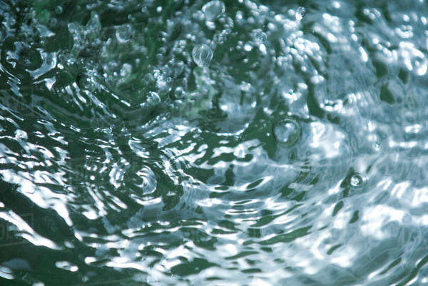 Surface of water, high angle view - Stock Photo - Dissolve