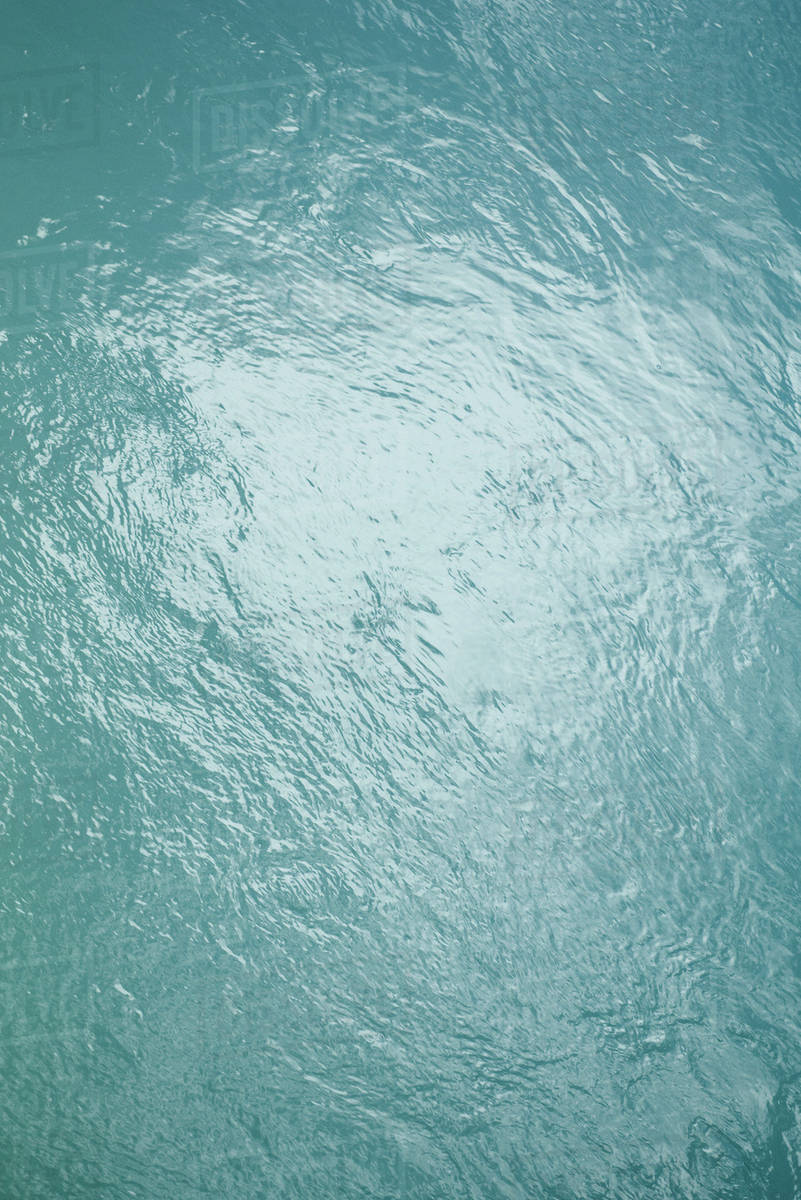 Surface of water, directly above - Stock Photo - Dissolve