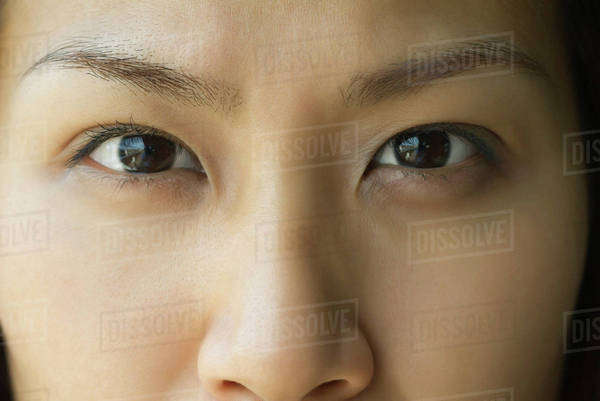 Face of woman, cropped - Stock Photo - Dissolve