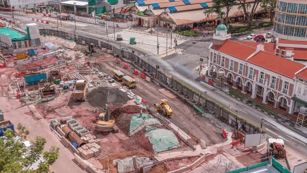 A large construction site in the city timelapse, the process of massive ...
