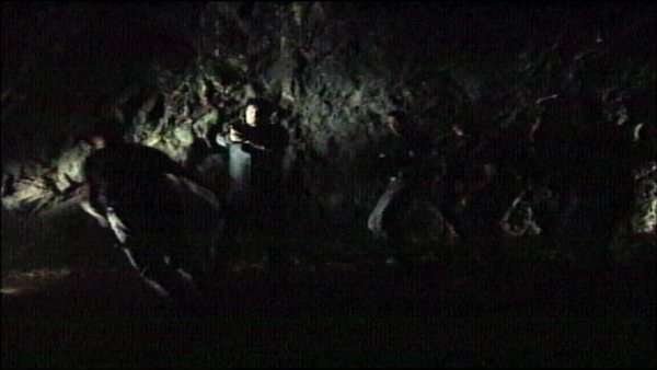 Montage of alien creatures attacking soldiers in a cave. 1980s movie ...