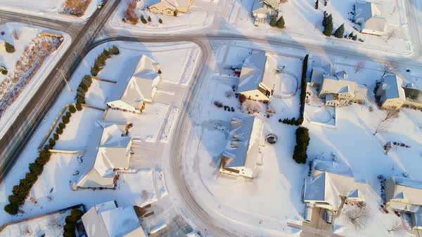 Beautiful neighborhoods in the grip of Winter, homes frozen under snow ...