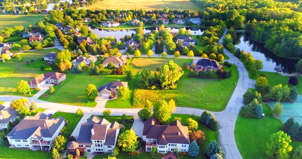 Beautiful neighborhoods, homes in Autumn, around lakes, aerial view ...