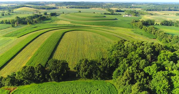 Stunning striped green fields over rolling hills, rural Wisconsin in ...