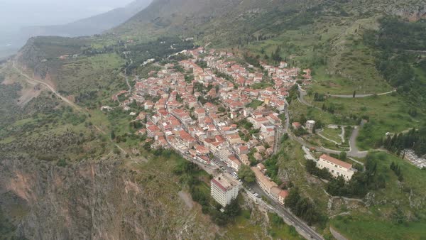 Aerial view of modern Delphi town, near archaeological site of ancient ...