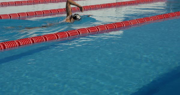 Swimmer Swimming Away from Camera in Swimming Pool Lanes. - Stock Video ...