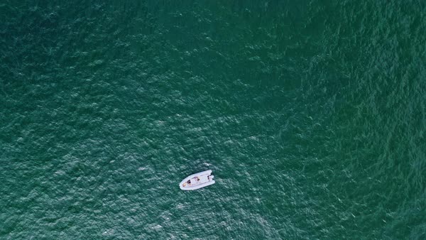 Sailing catamaran floating water surface top view. Luxury sailboat ...