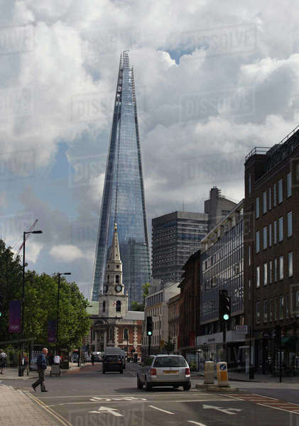 The Shard and city streets with surrounding buildings, London, UK ...