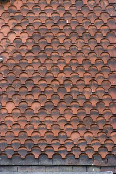 Scalloped tile roof detail on residential house, London. - Royalty-free ...
